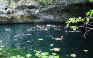 Zip Line into a Cenote in the Yucatan Peninsula of Mexico